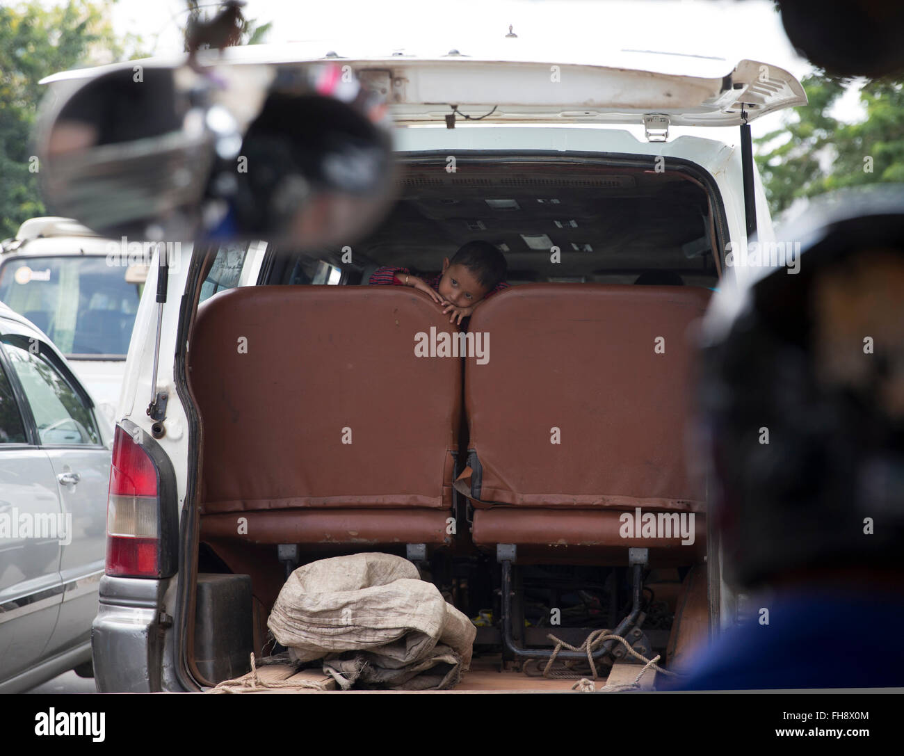 open van in street in Phnom Penh, Cambodia Stock Photo - Alamy