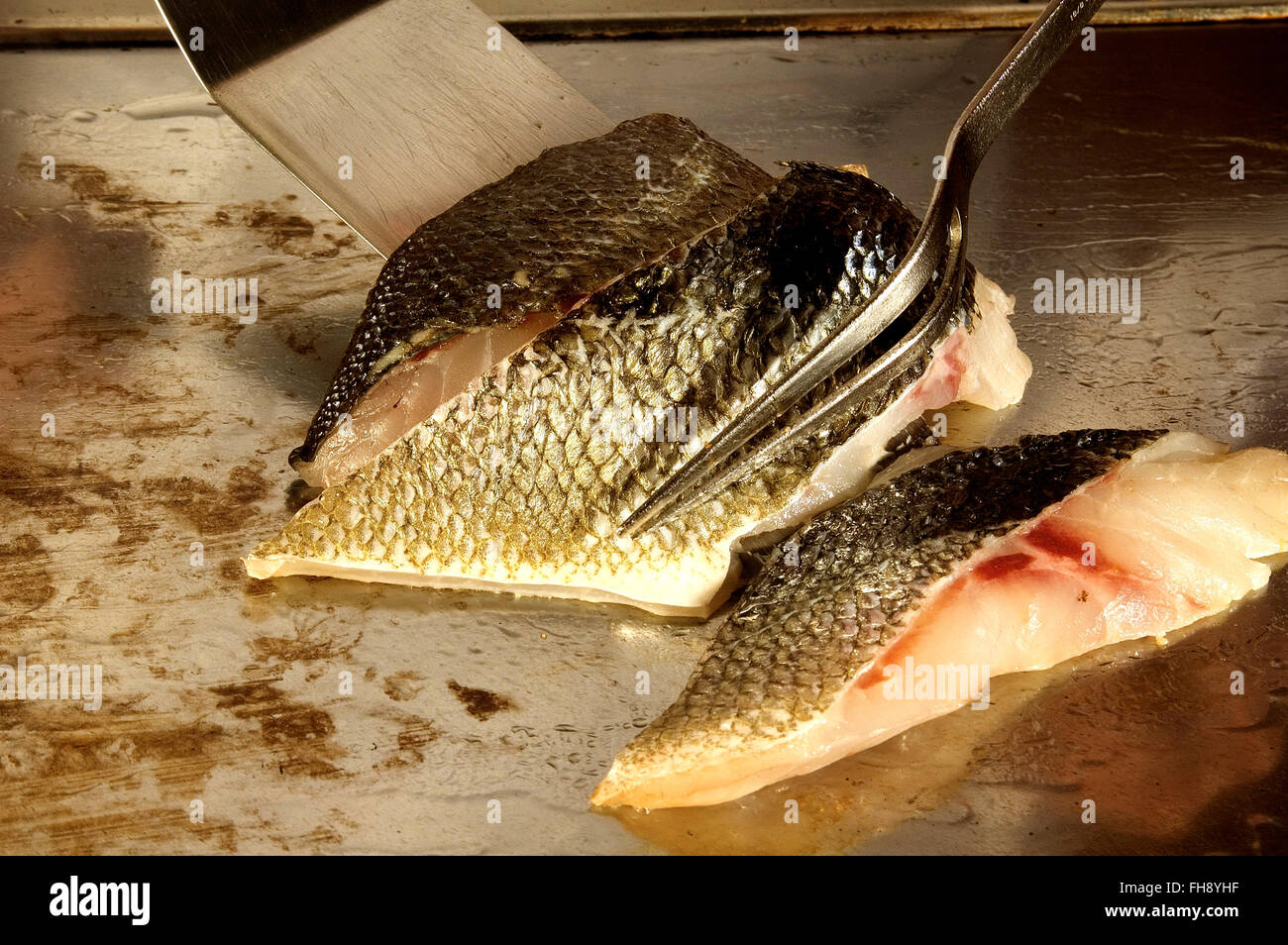 Preparing fish for a restaurant Stock Photo - Alamy