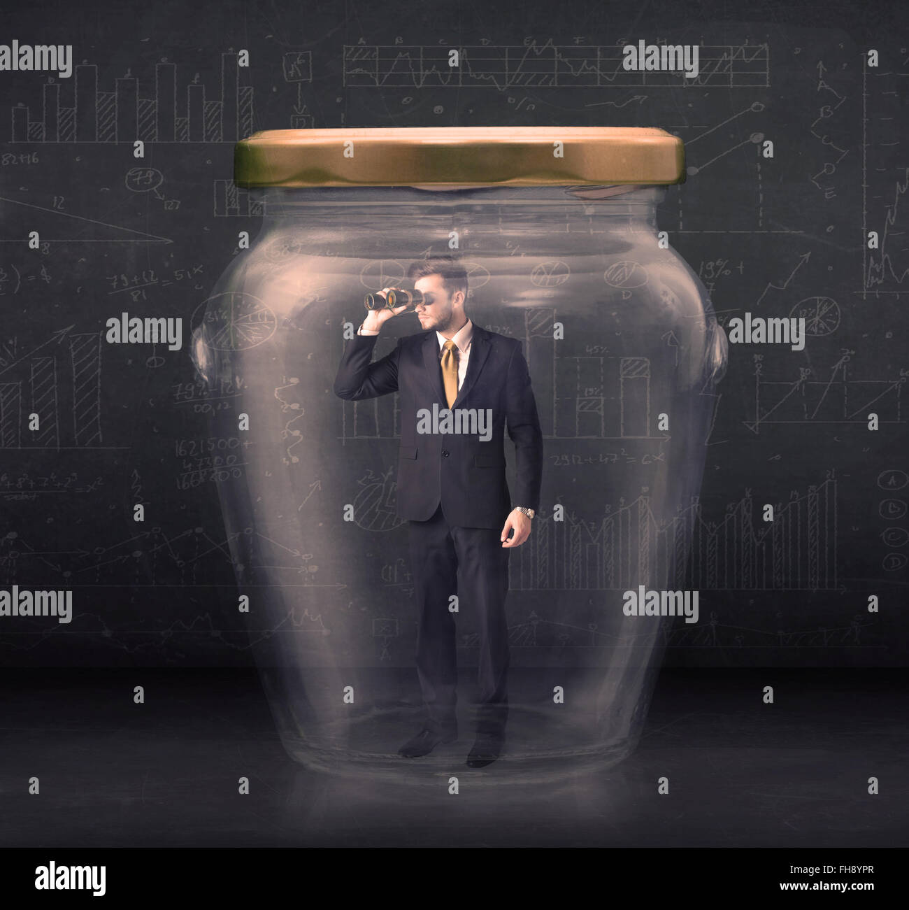 Business man closed into a glass jar concept Stock Photo - Alamy