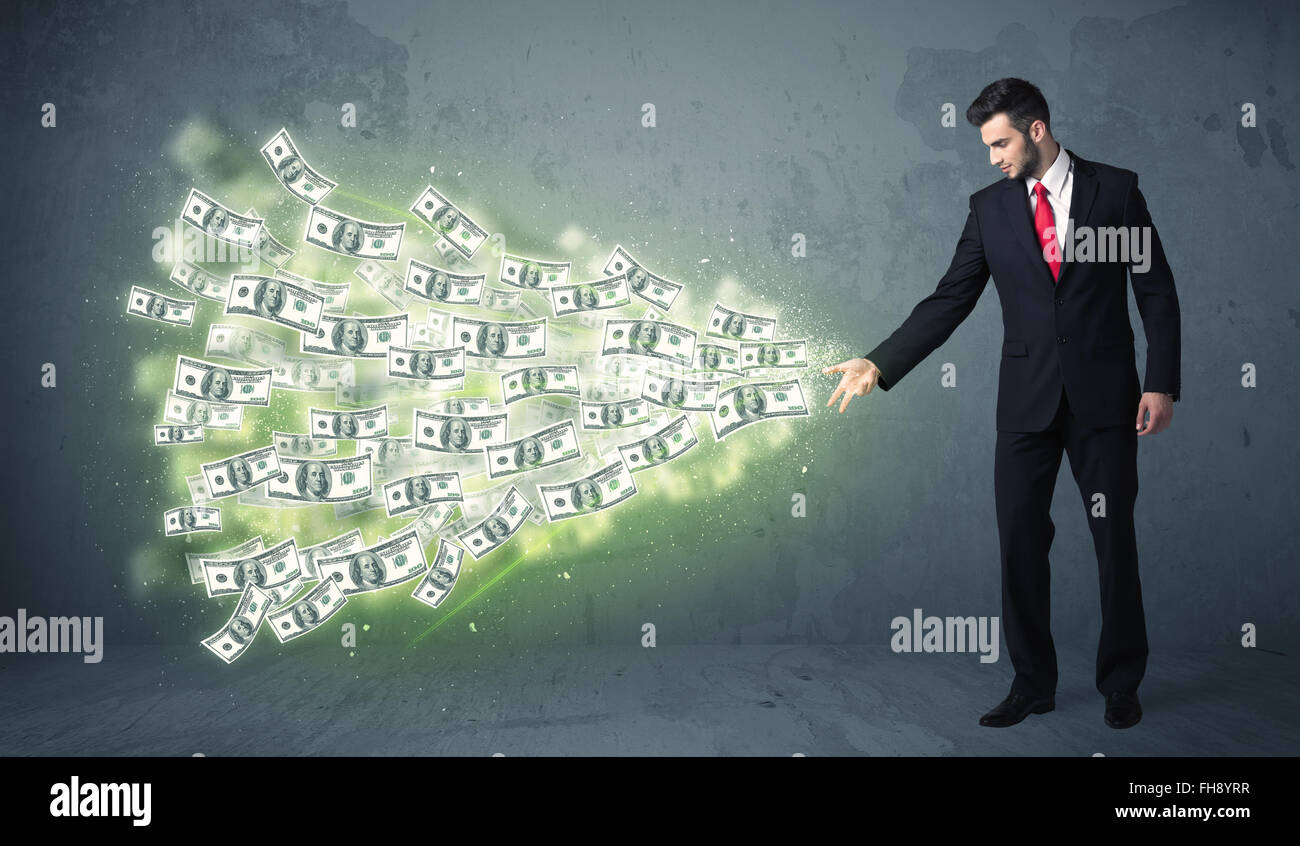 Business person throwing a lot of dollar bills concept Stock Photo - Alamy