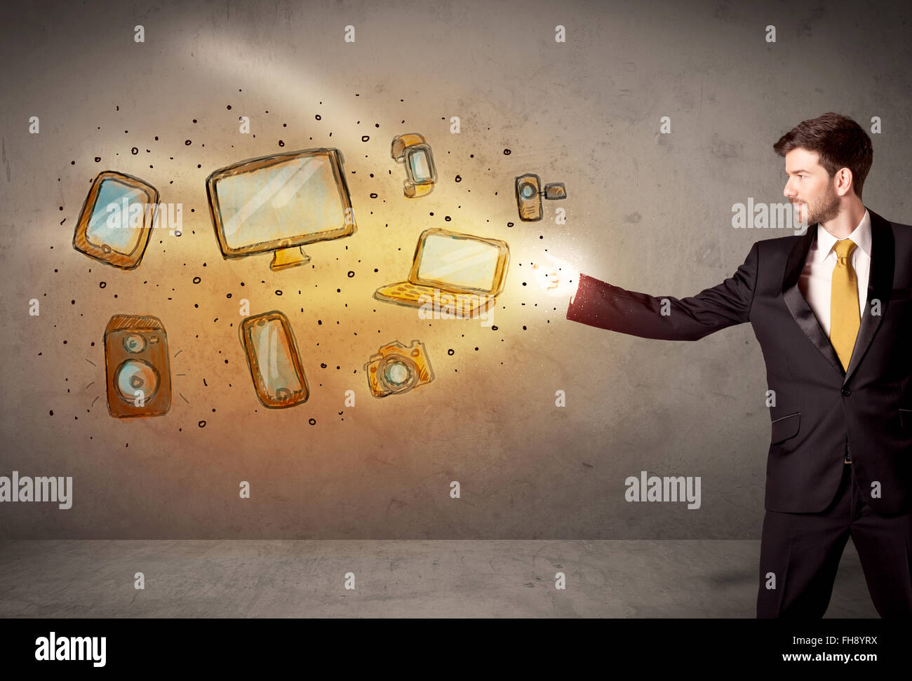 Man throwing hand drawn electronical devices Stock Photo - Alamy
