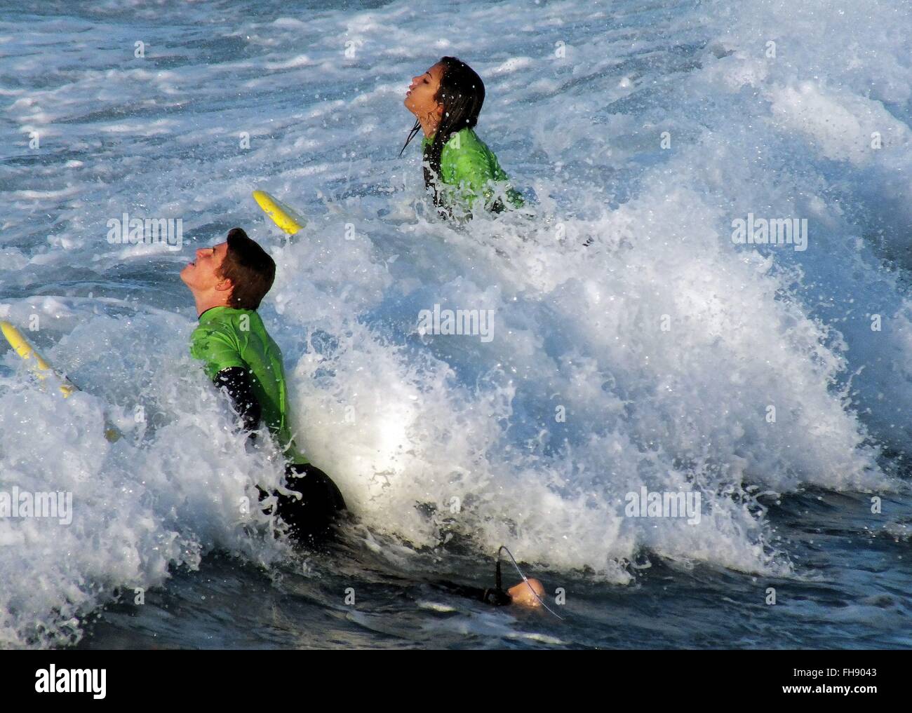 Fighting surfers hi-res stock photography and images - Alamy