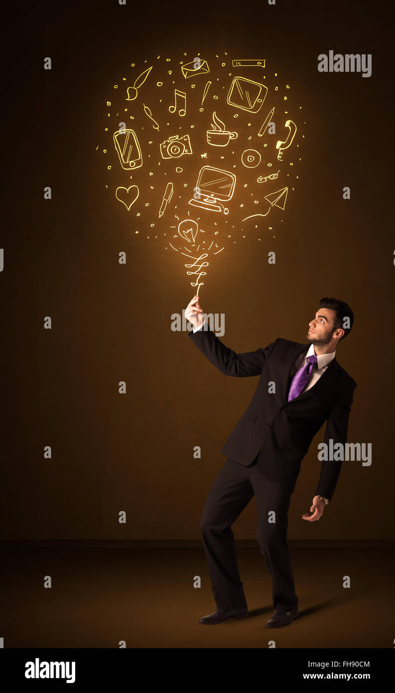 Businessman with a social media balloon Stock Photo - Alamy
