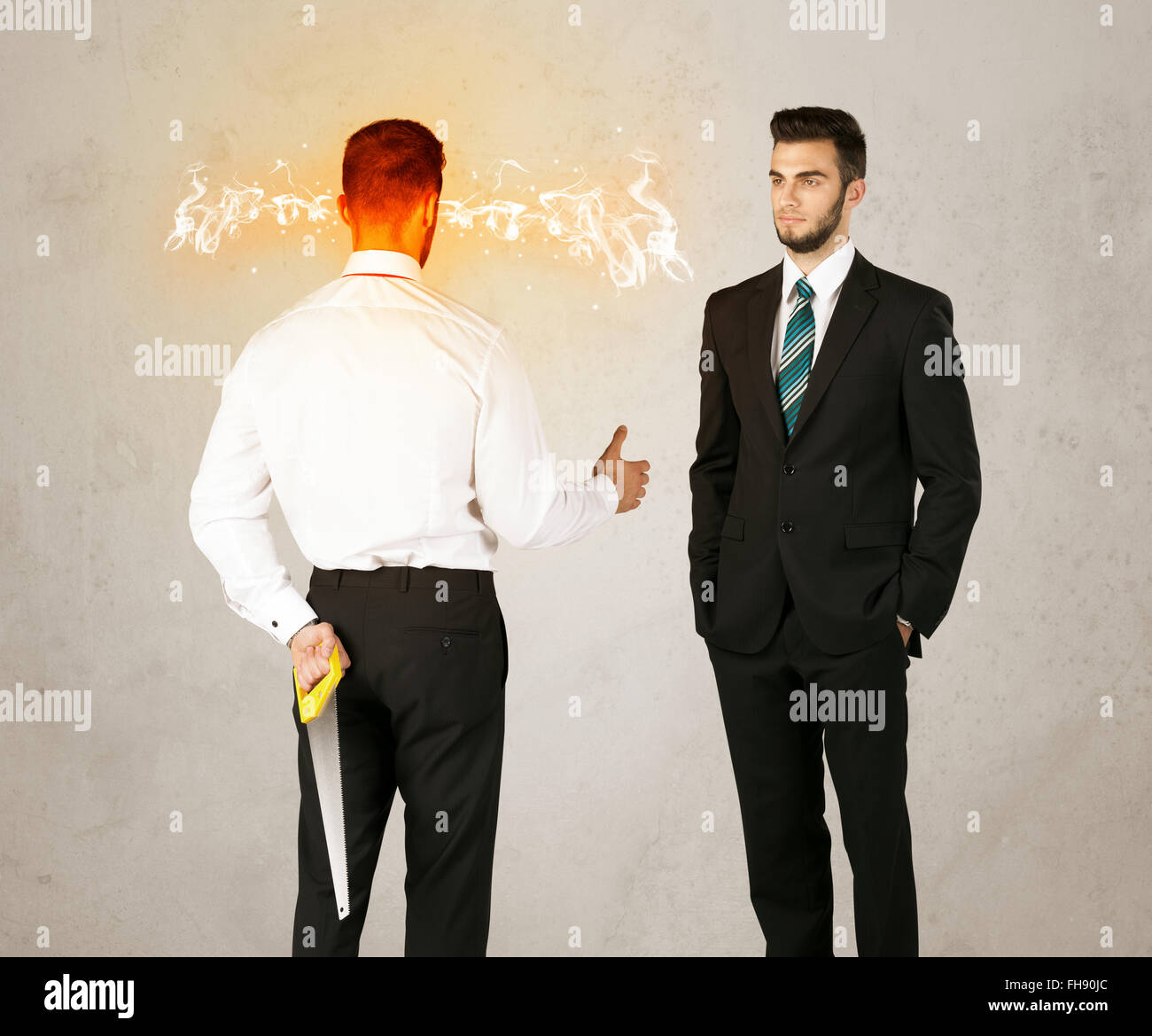 Angry businessman with weapon Stock Photo - Alamy