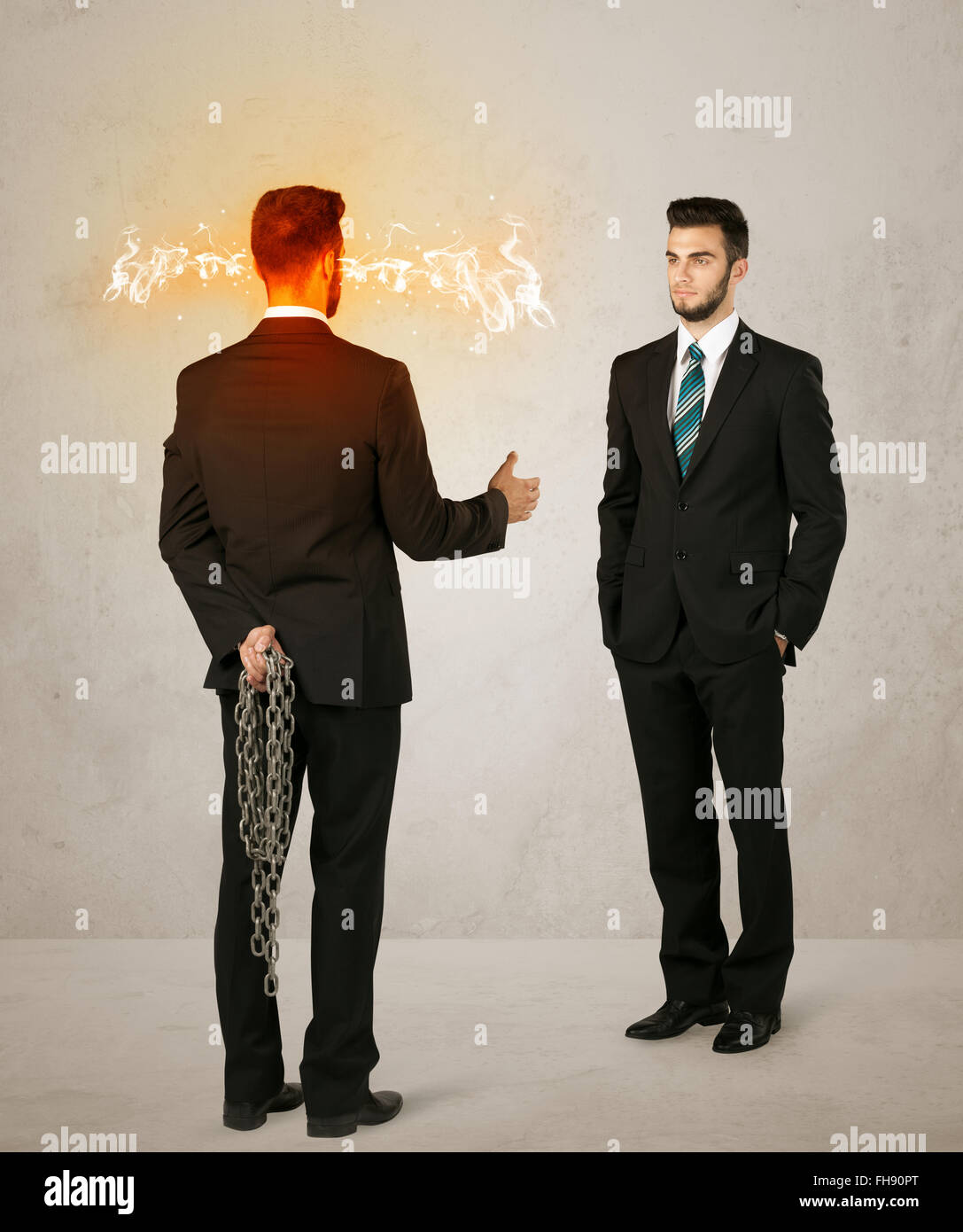 Angry businessman with weapon Stock Photo - Alamy
