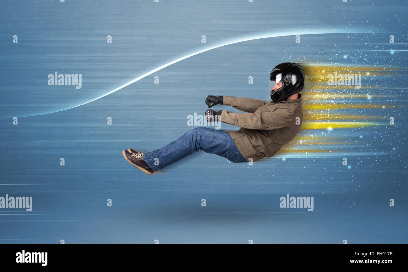 Young man driving in imaginary fast car with blurred lines Stock Photo ...