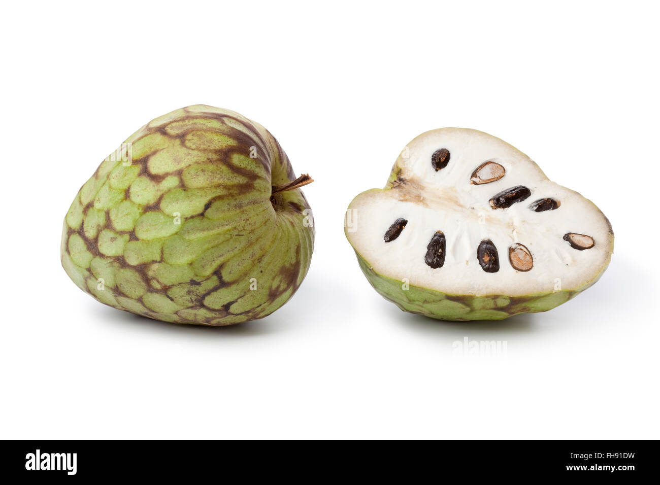 Whole and partial fresh Cherimoya fruit isolated on white background ...