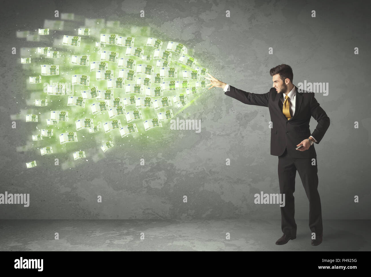 Young business person throwing money concept Stock Photo - Alamy