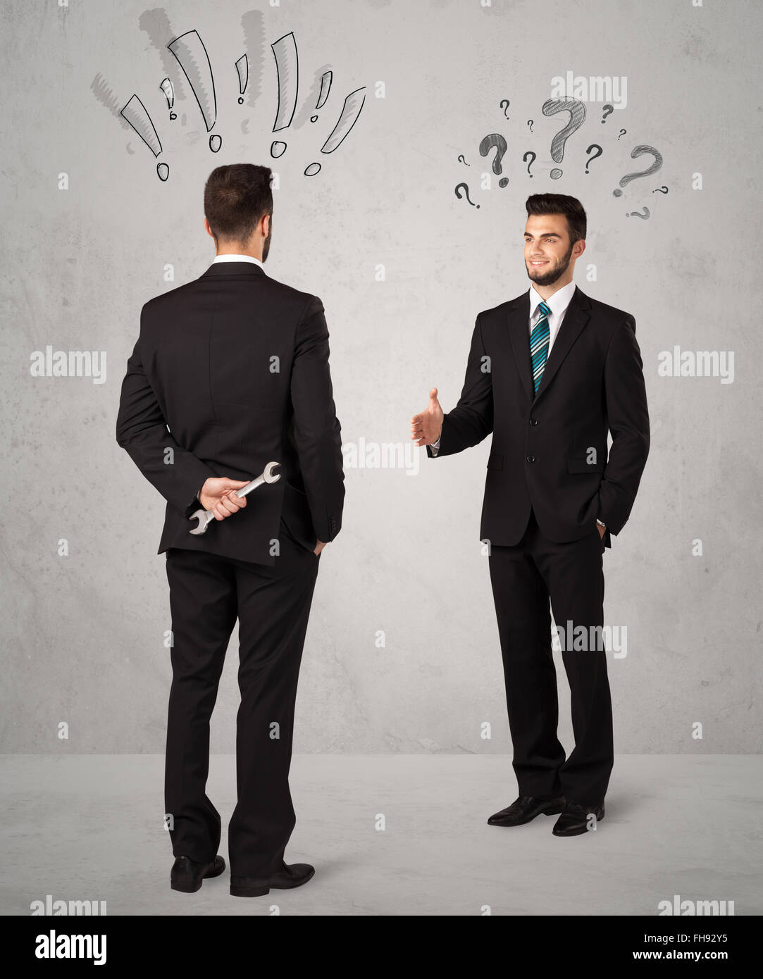 Ruthless business handshake Stock Photo - Alamy