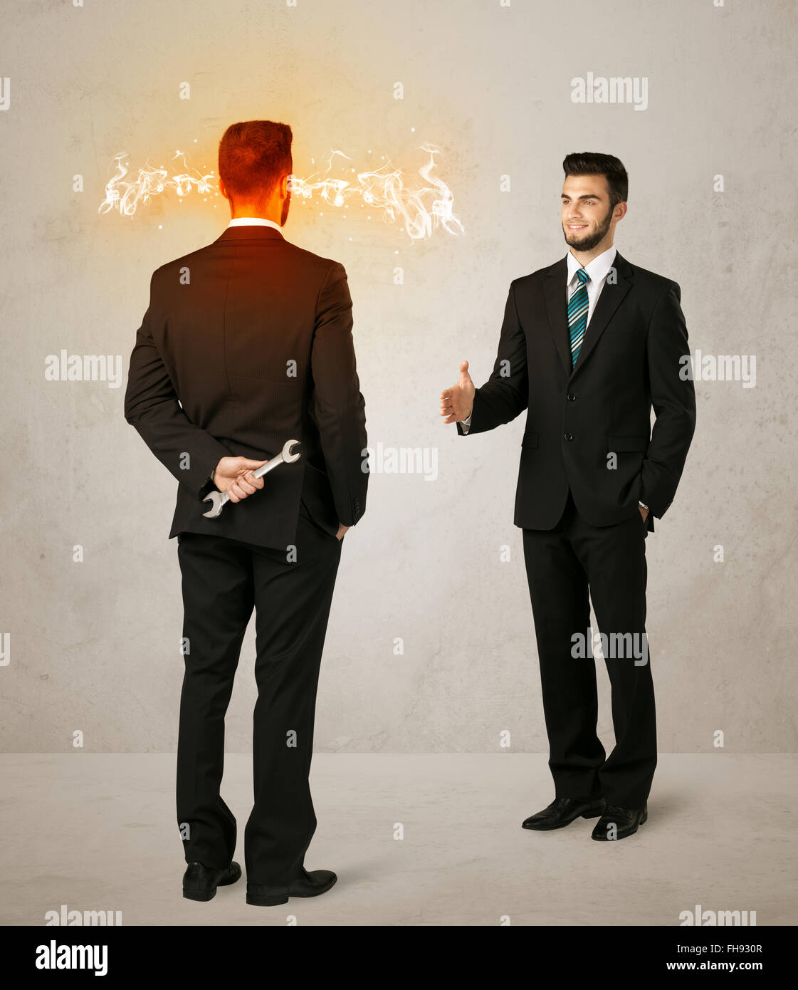 Angry businessman with weapon Stock Photo - Alamy