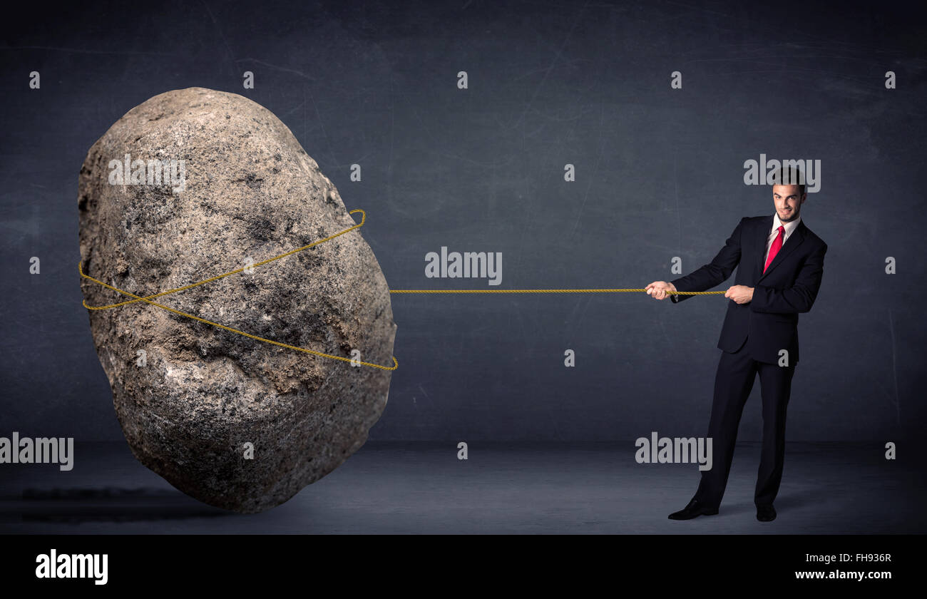 Pulling huge rock hi-res stock photography and images - Alamy