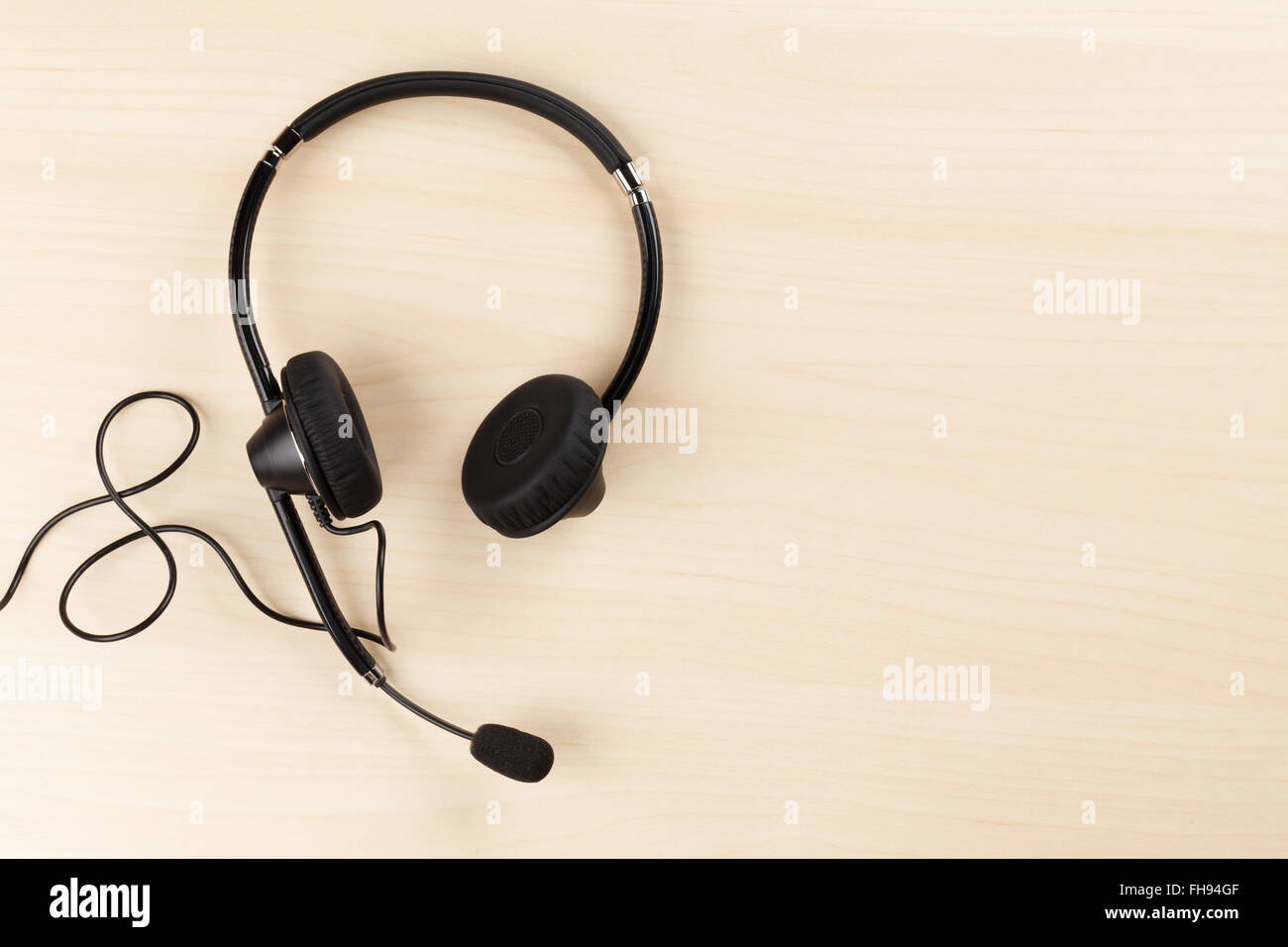 Office desk with headset. Call center support table. Top veiw with copy ...