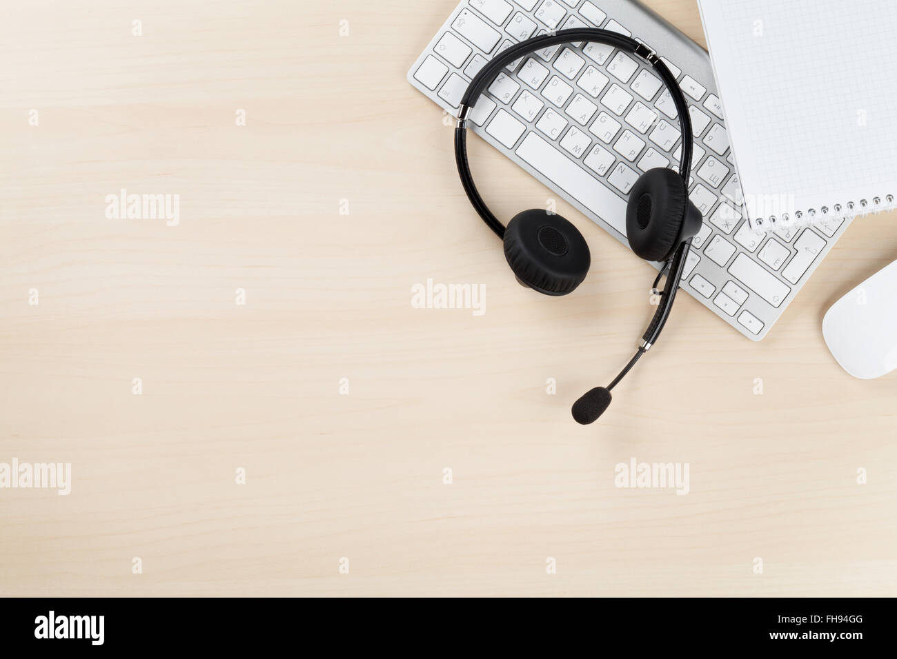 Office desk with headset and pc. Call center support table. Top veiw ...