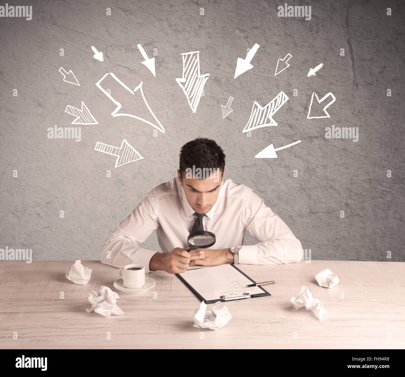 Busy office worker with drawn arrows Stock Photo - Alamy