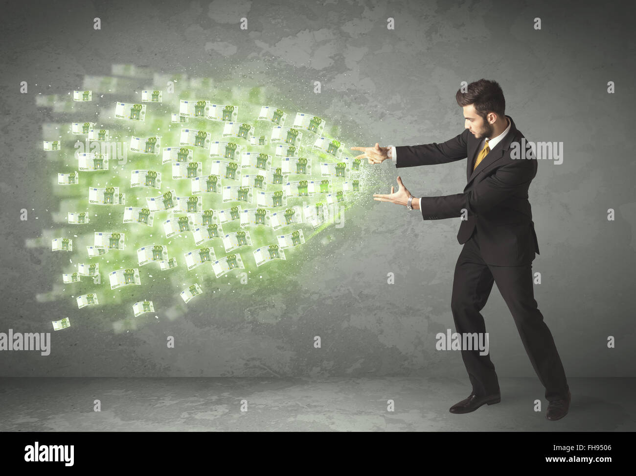 Young business person throwing money concept Stock Photo - Alamy