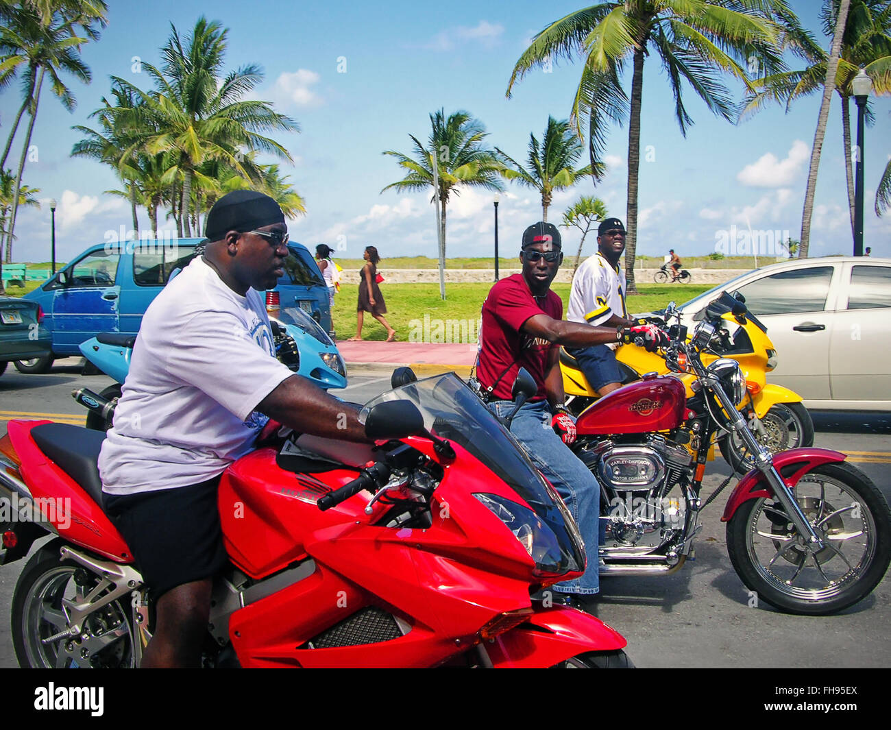 Motorcycle helmet and a bike with people i hi-res stock photography and ...