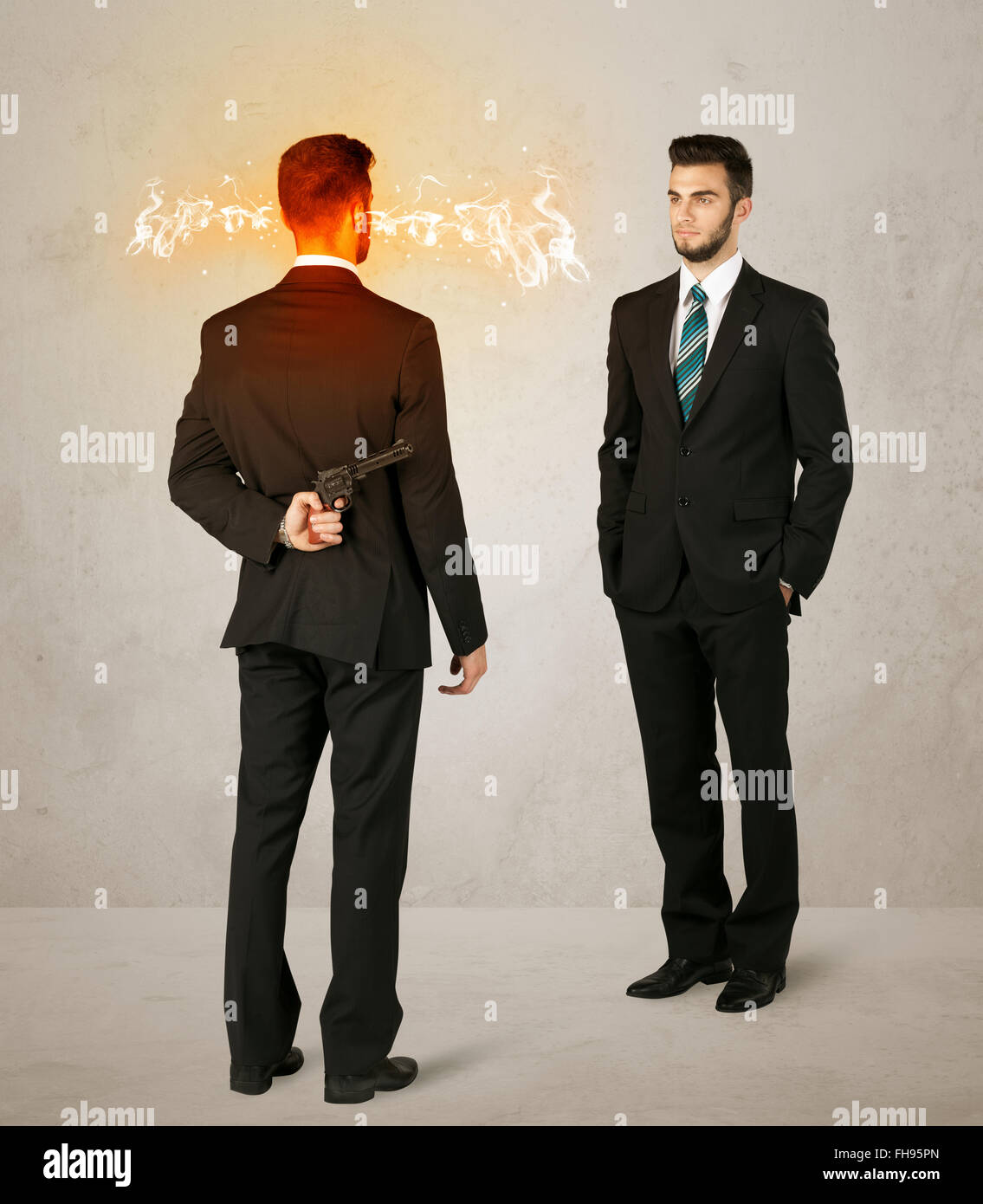 Angry businessman with weapon Stock Photo - Alamy