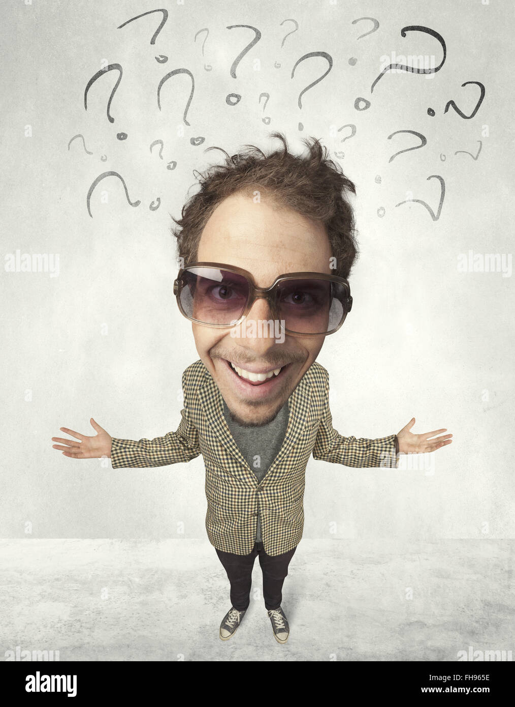 Big head person with question marks Stock Photo - Alamy