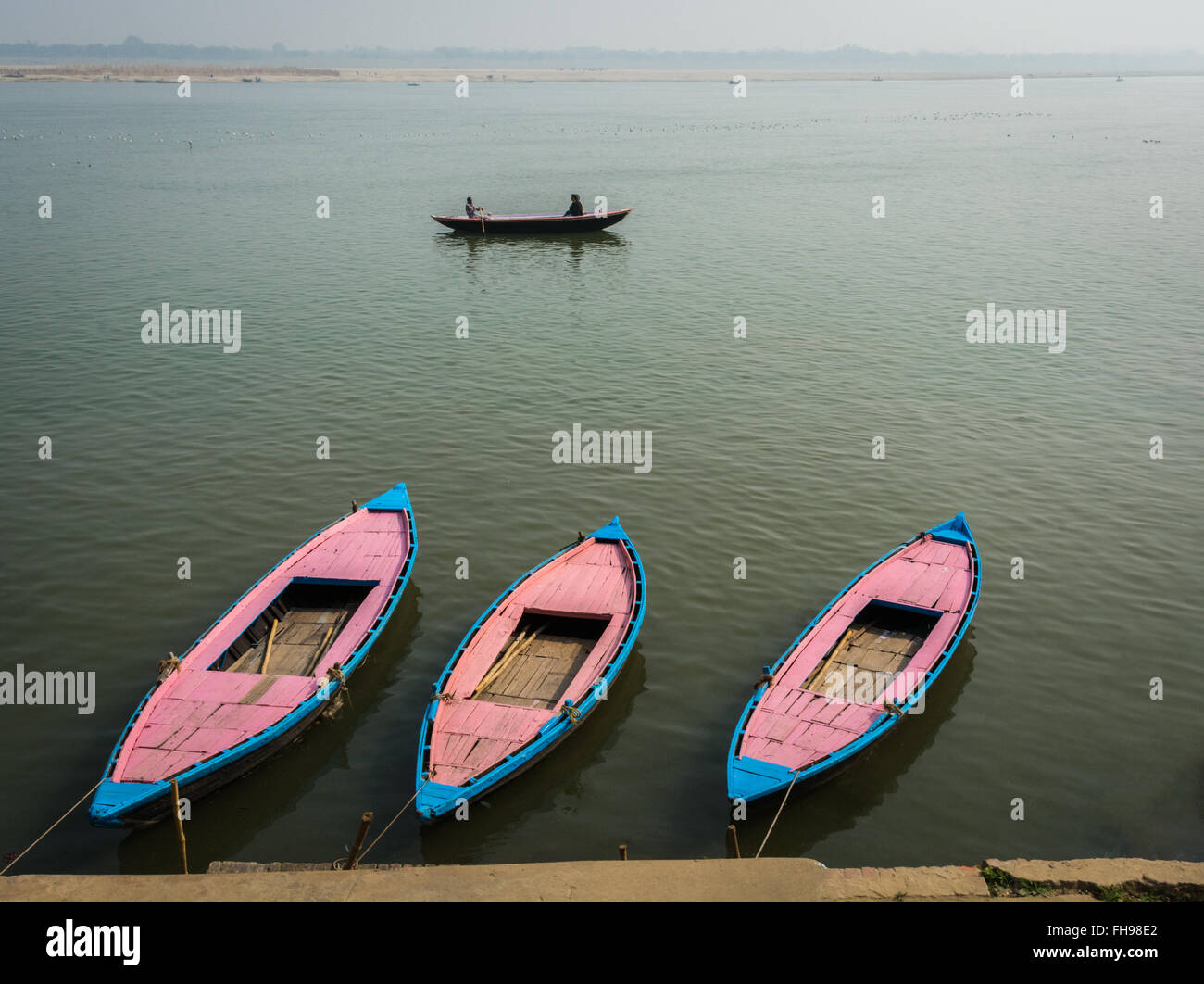 Row boats on the River Ganges in Varanasi, India Stock Photo - Alamy