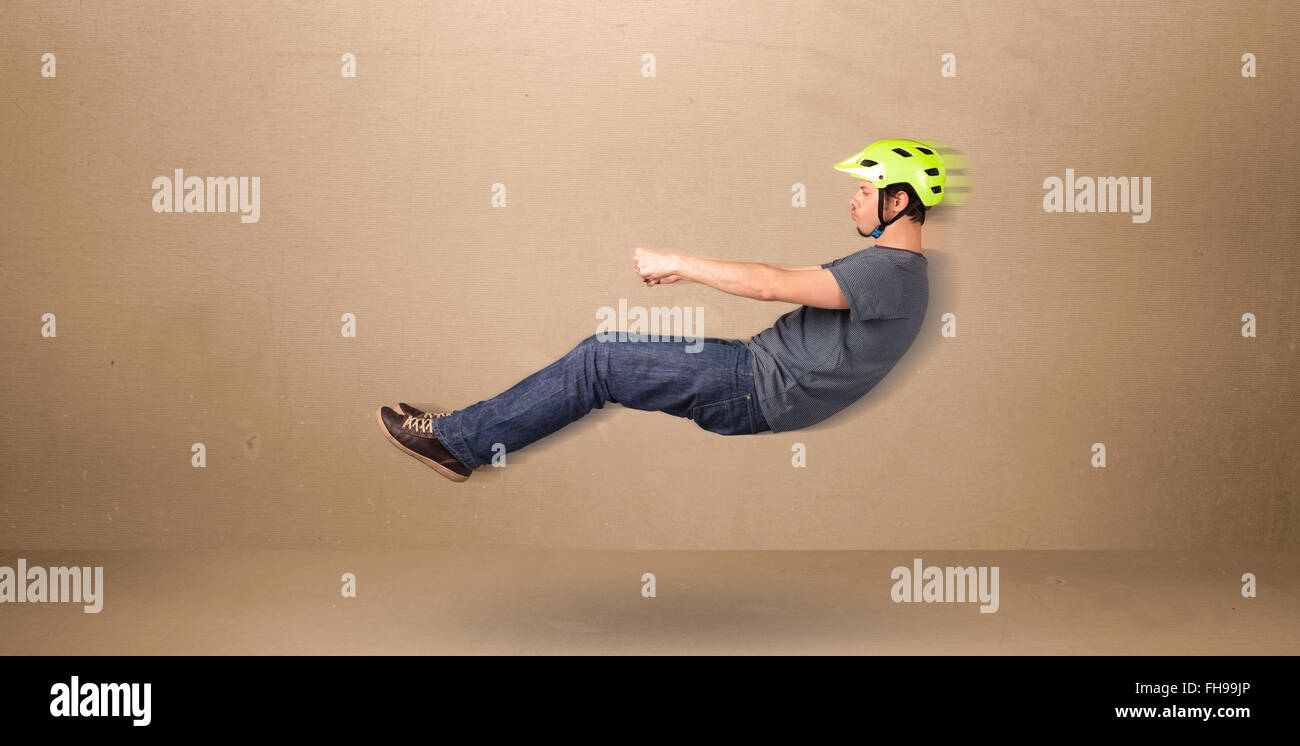 Happy funny man driving a flying car concept Stock Photo - Alamy