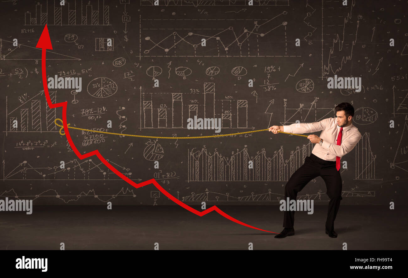 Businessman pulling a red arrow upright with a rope Stock Photo - Alamy