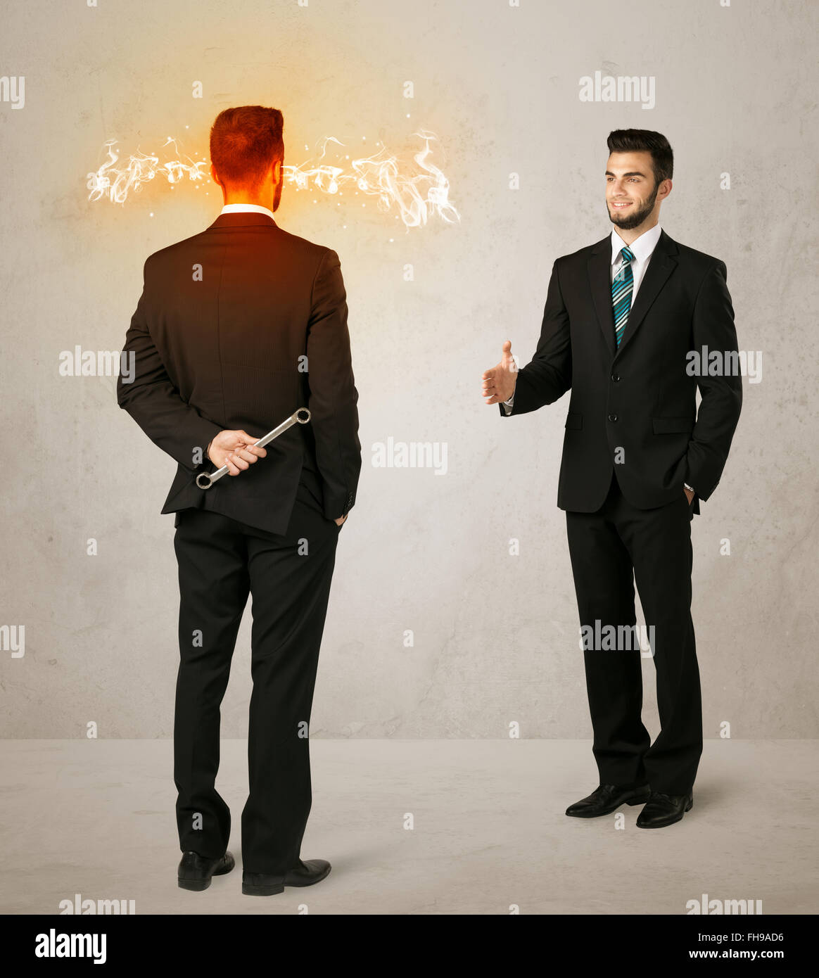 Angry businessman with weapon Stock Photo - Alamy