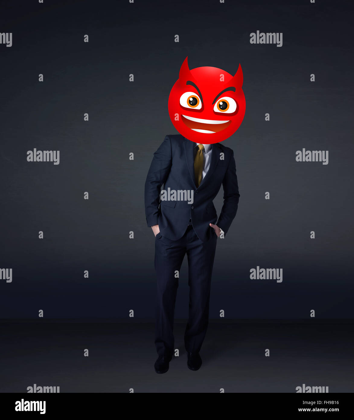 businessman wears devil smiley face Stock Photo - Alamy