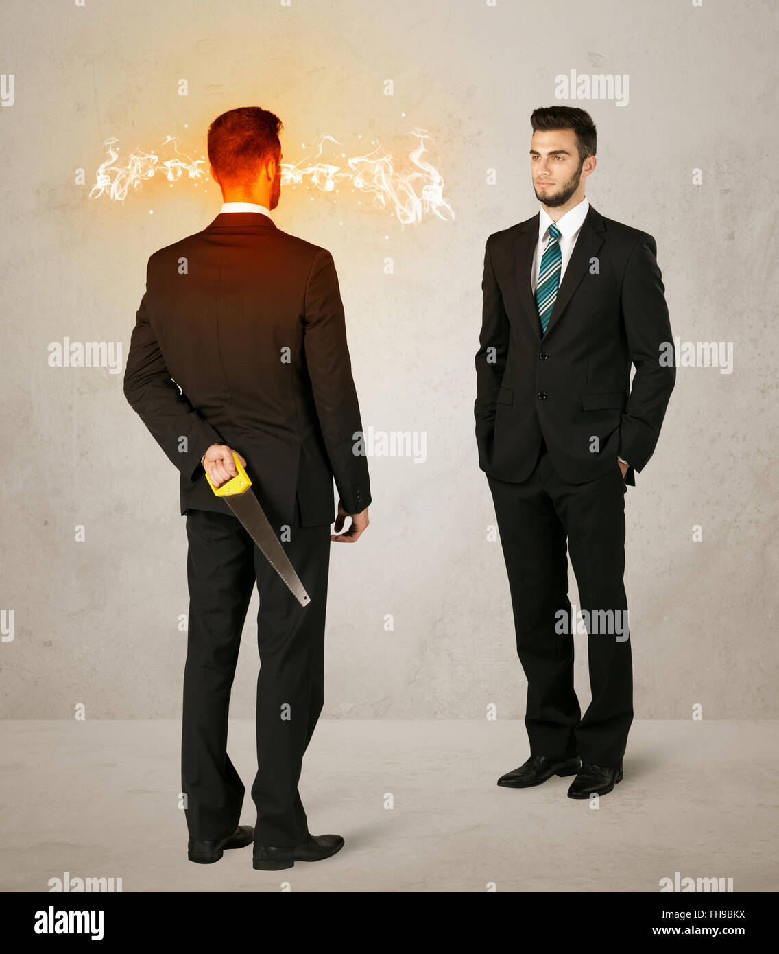 Angry businessman with weapon Stock Photo - Alamy