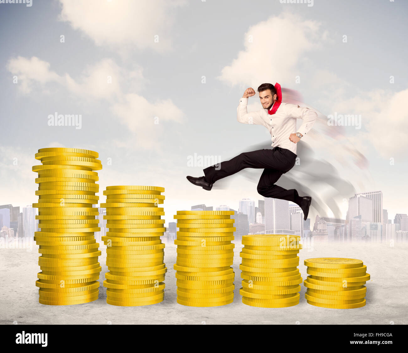 Successful business man jumping up on gold coin money Stock Photo - Alamy