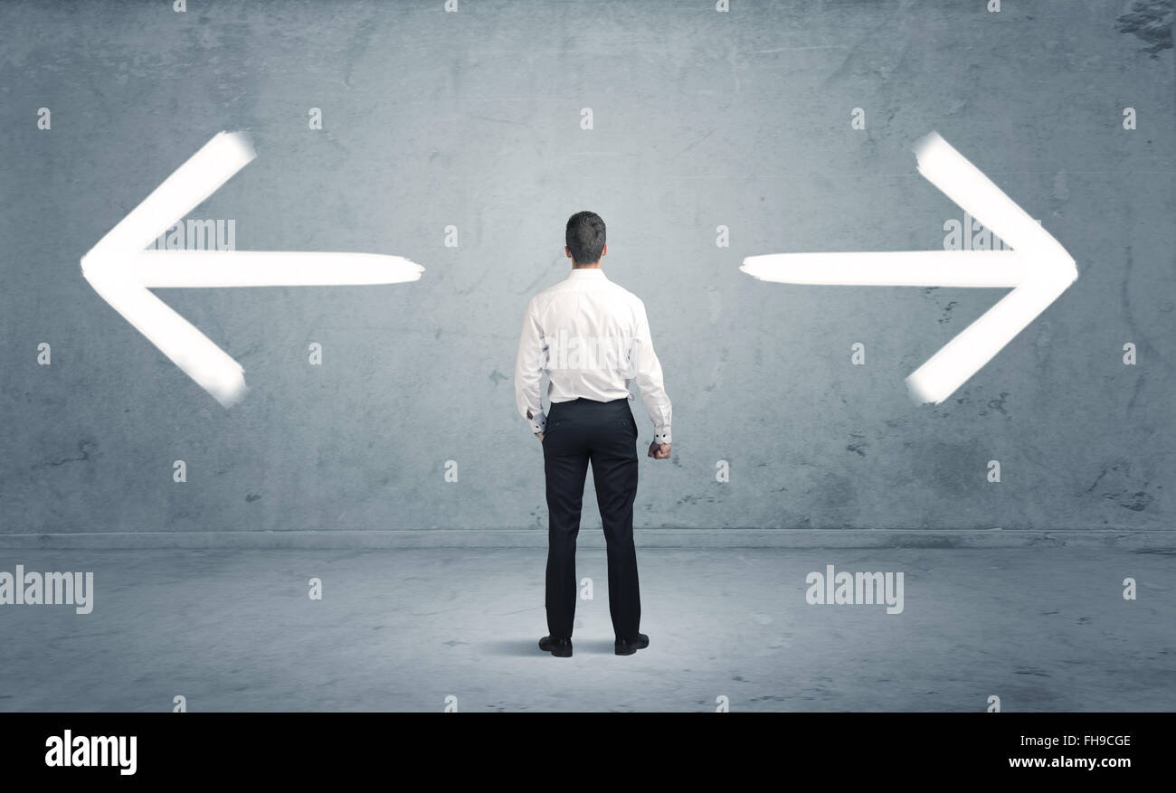 Confused business person choosing the way Stock Photo - Alamy