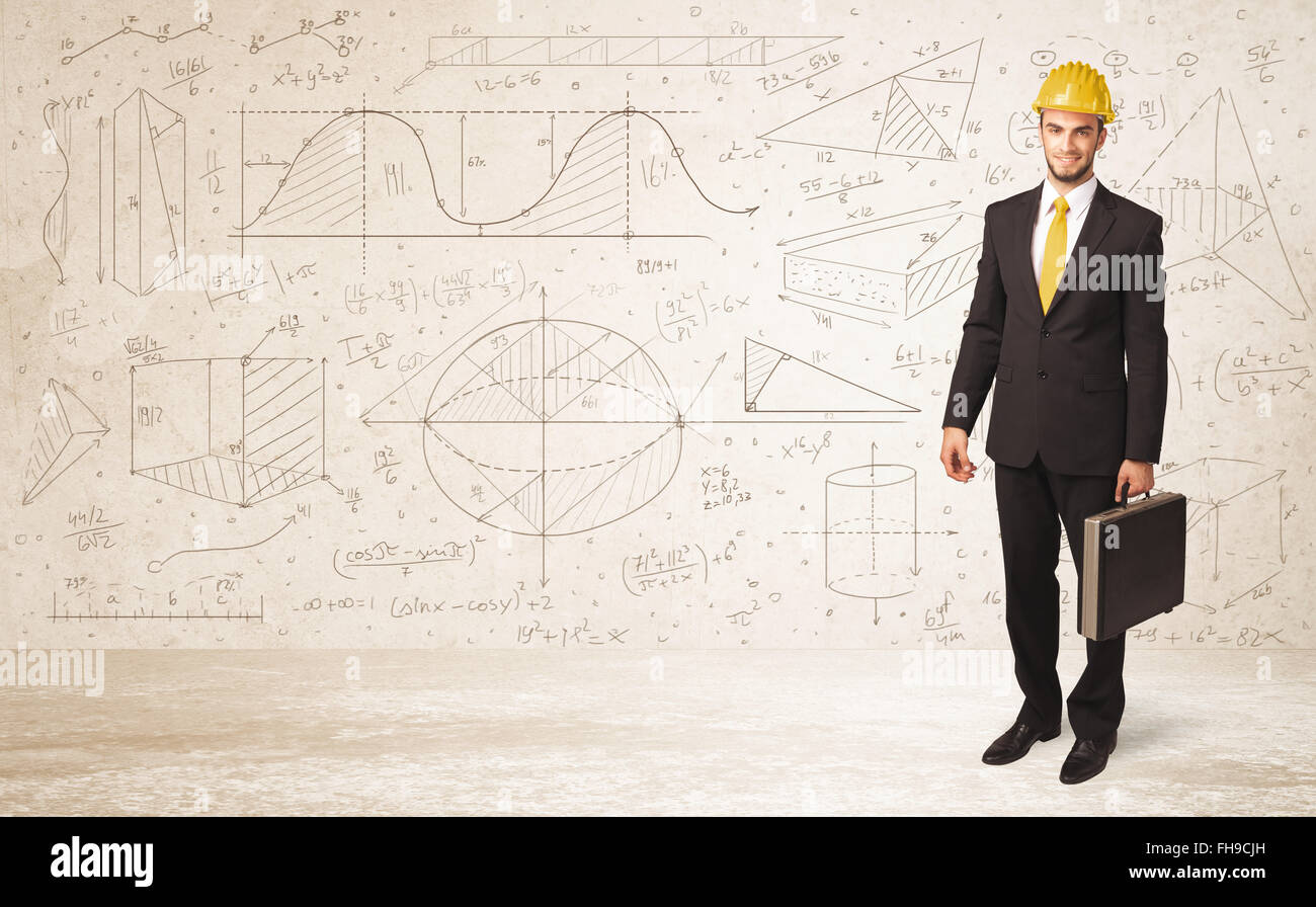 Handsome engineer calculating with hand drawn background Stock Photo ...