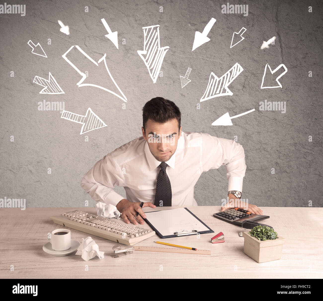 Busy office worker with drawn arrows Stock Photo - Alamy