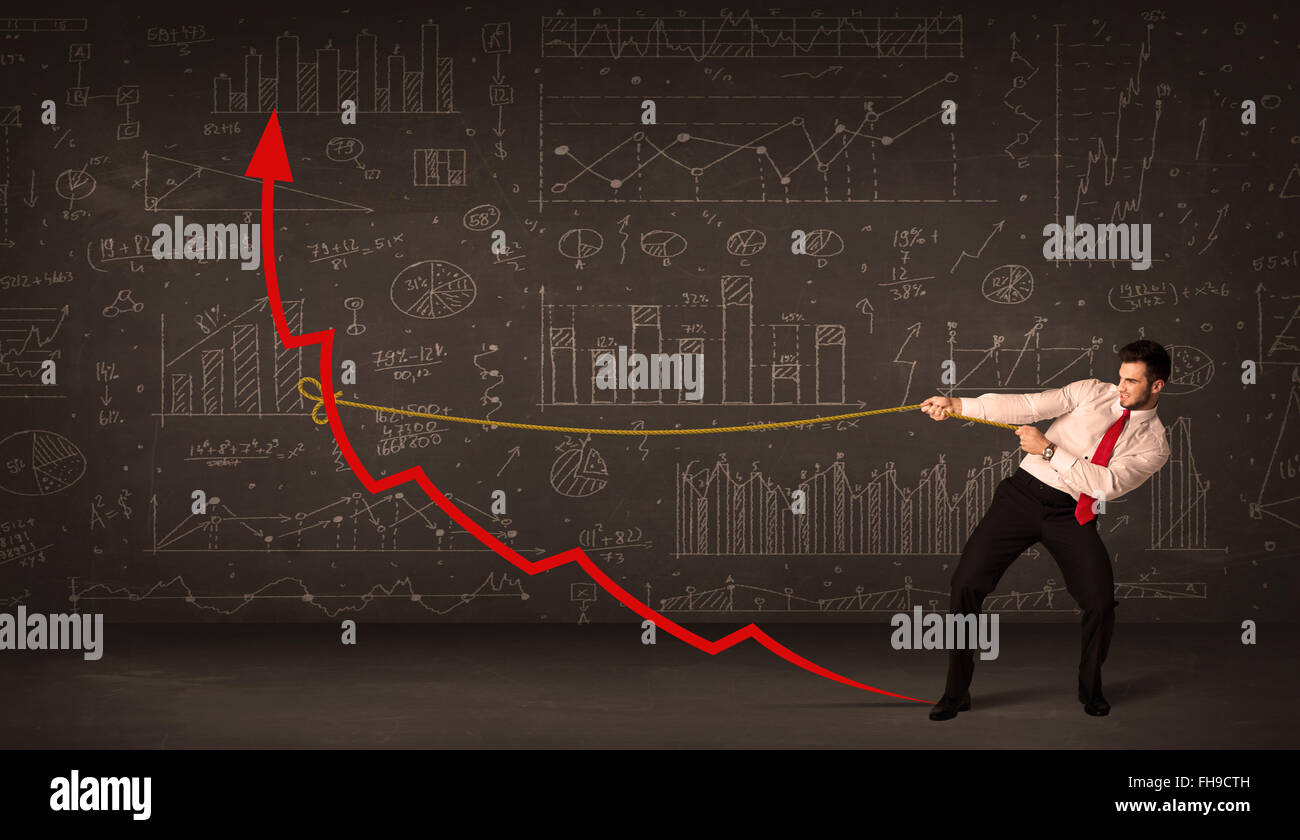 Businessman pulling a red arrow upright with a rope Stock Photo - Alamy