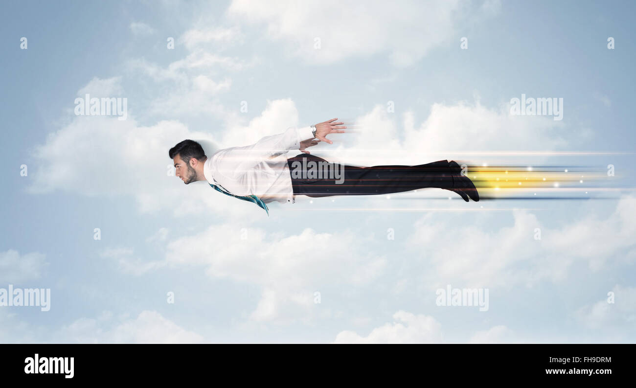 Happy business man flying fast on the sky between clouds Stock Photo ...