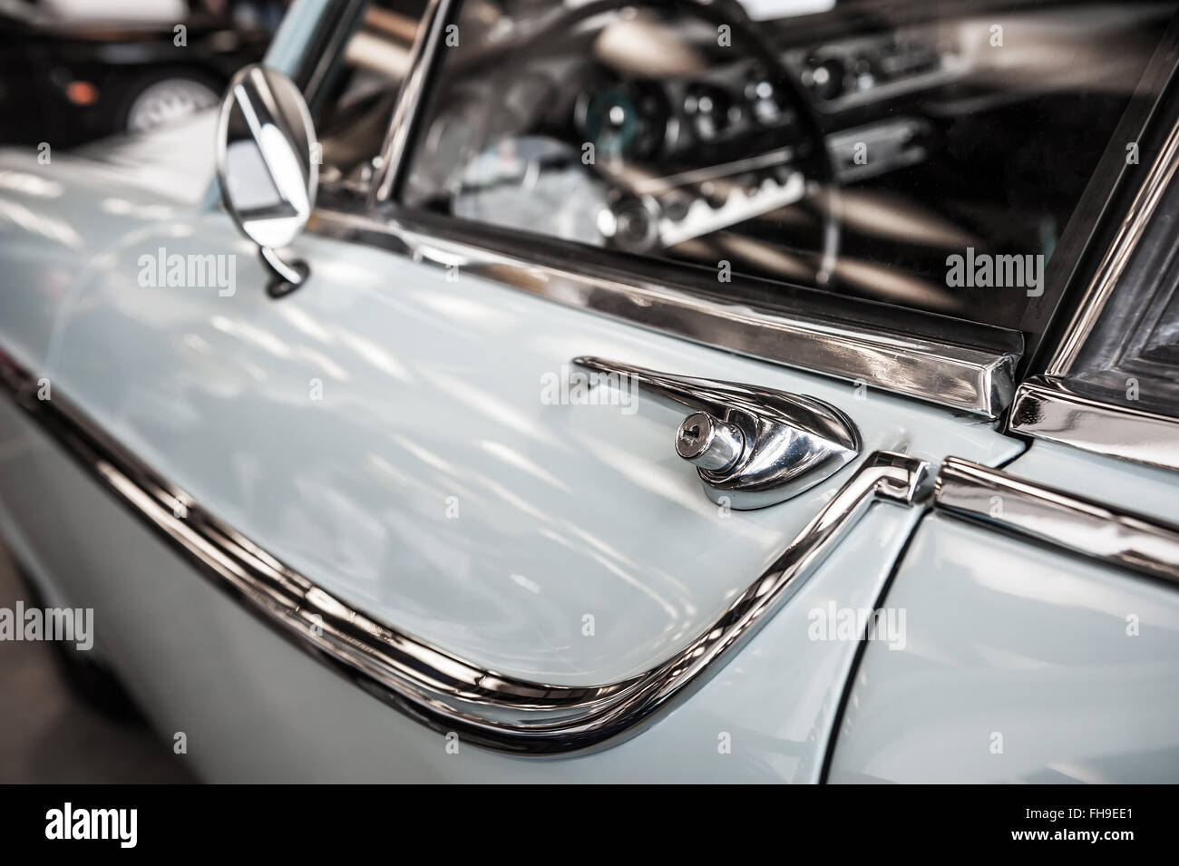 Vintage blue car with chrome detail in a salon Stock Photo - Alamy