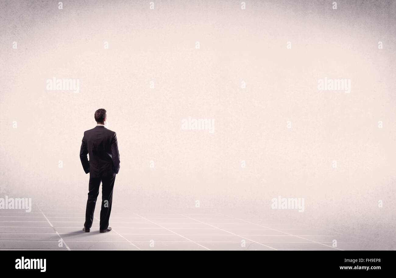 Business person standing in empty space Stock Photo - Alamy