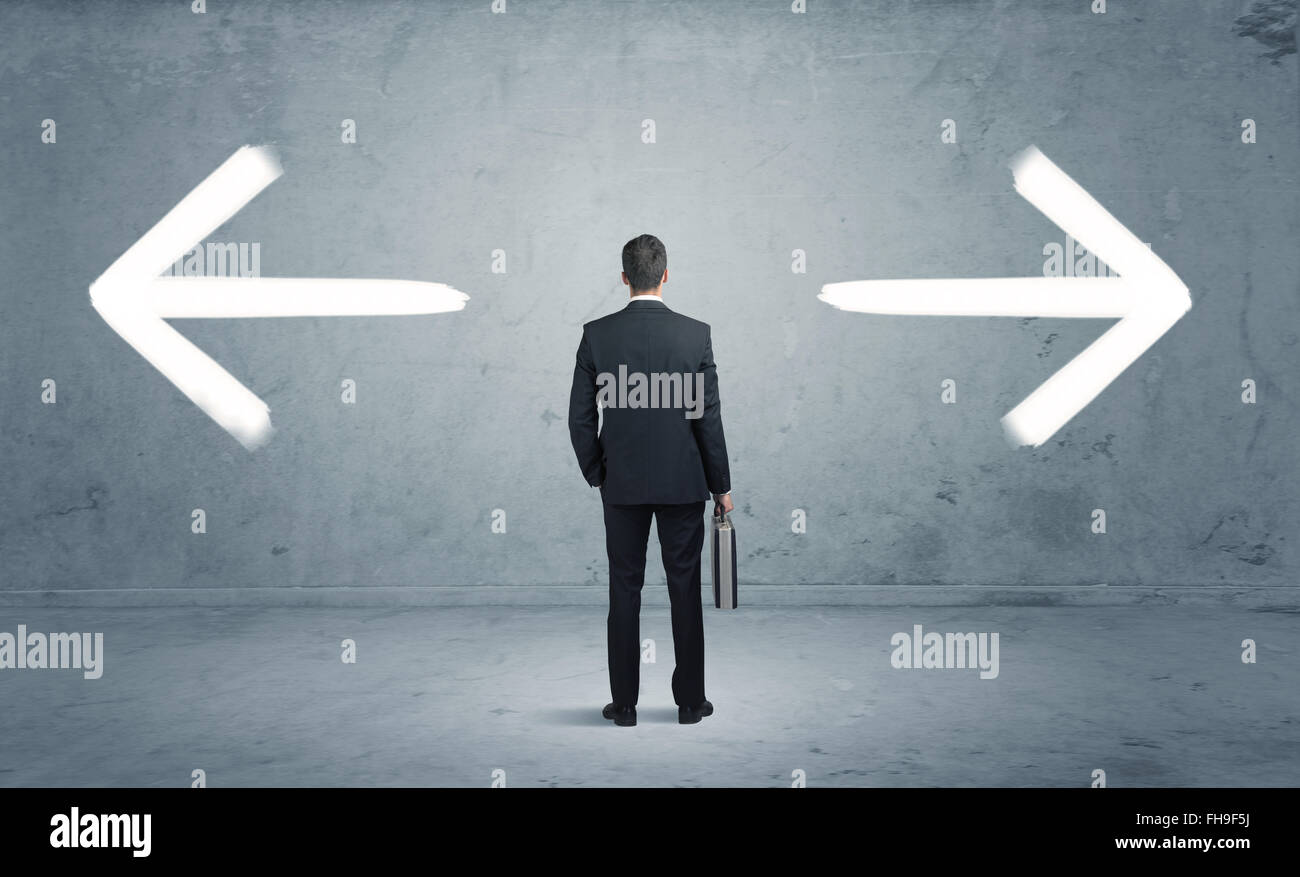 Confused business person choosing the way Stock Photo - Alamy