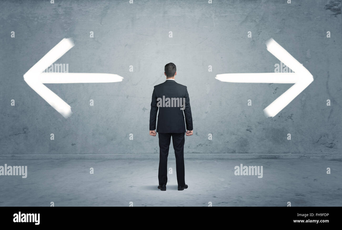 Confused business person choosing the way Stock Photo - Alamy