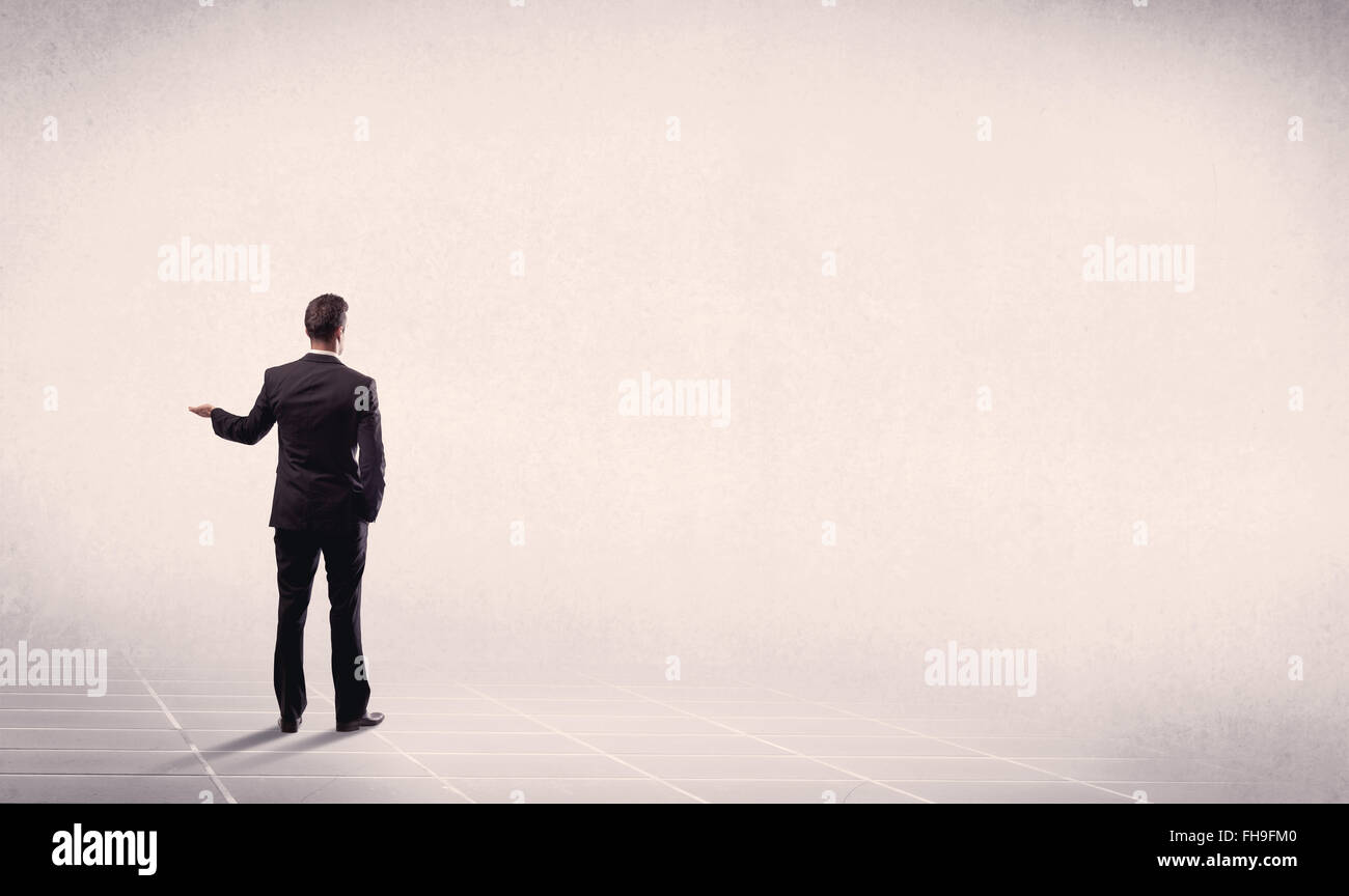 Business person standing in empty space Stock Photo - Alamy