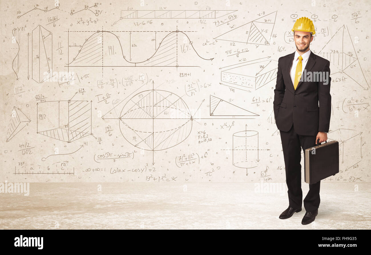Handsome engineer calculating with hand drawn background Stock Photo ...