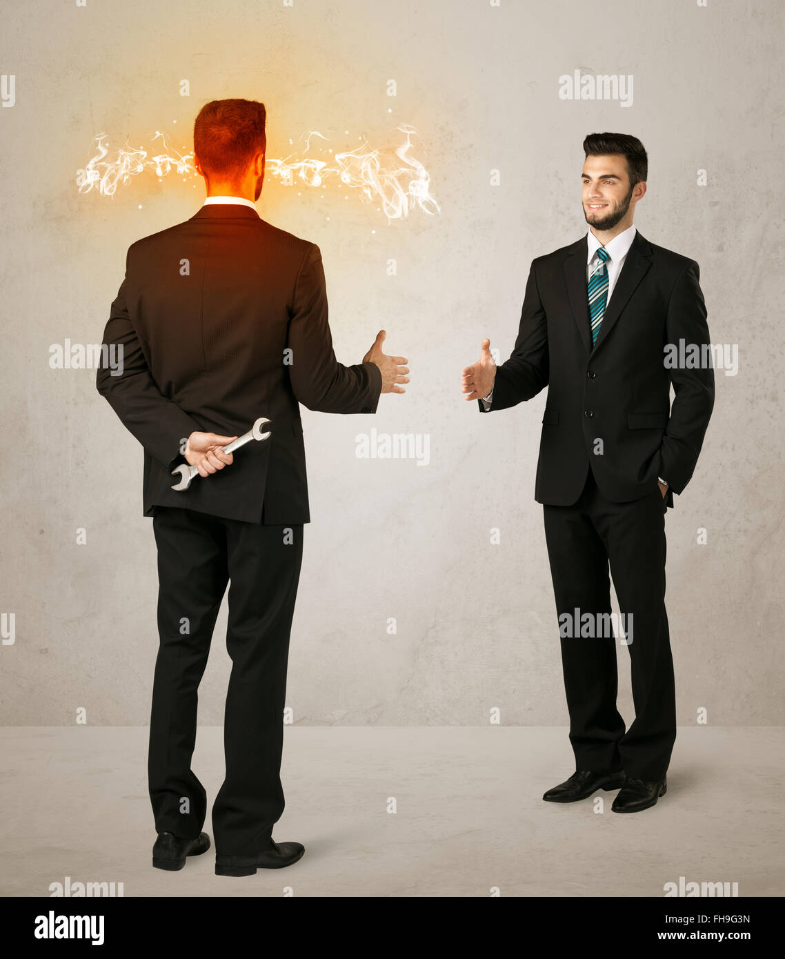 Angry businessman with weapon Stock Photo - Alamy