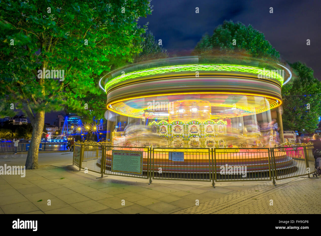 Carnival speed at night nearby London Eye Stock Photo - Alamy