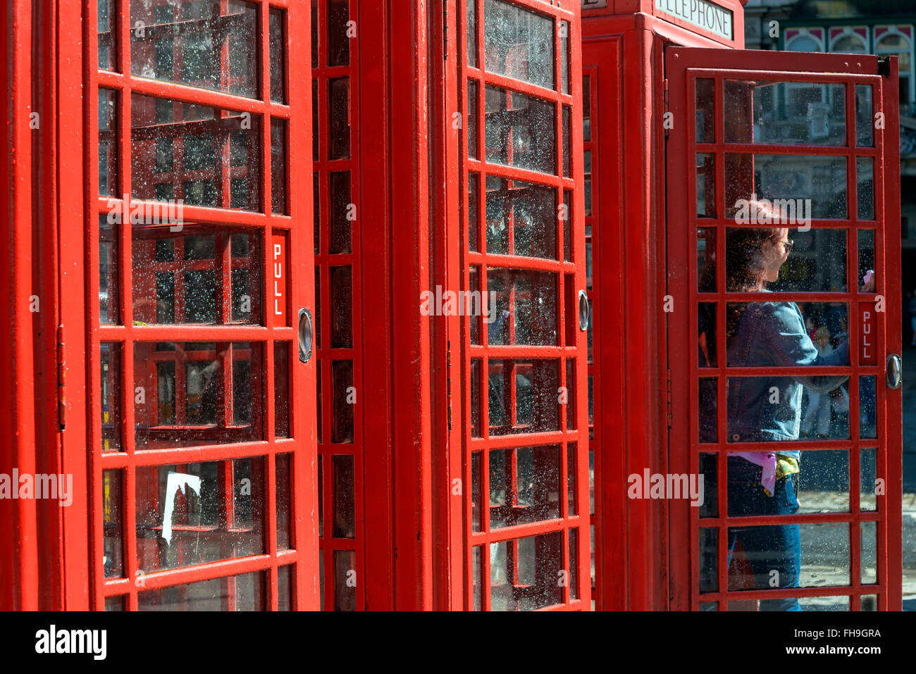 Four old red telephone hi-res stock photography and images - Alamy