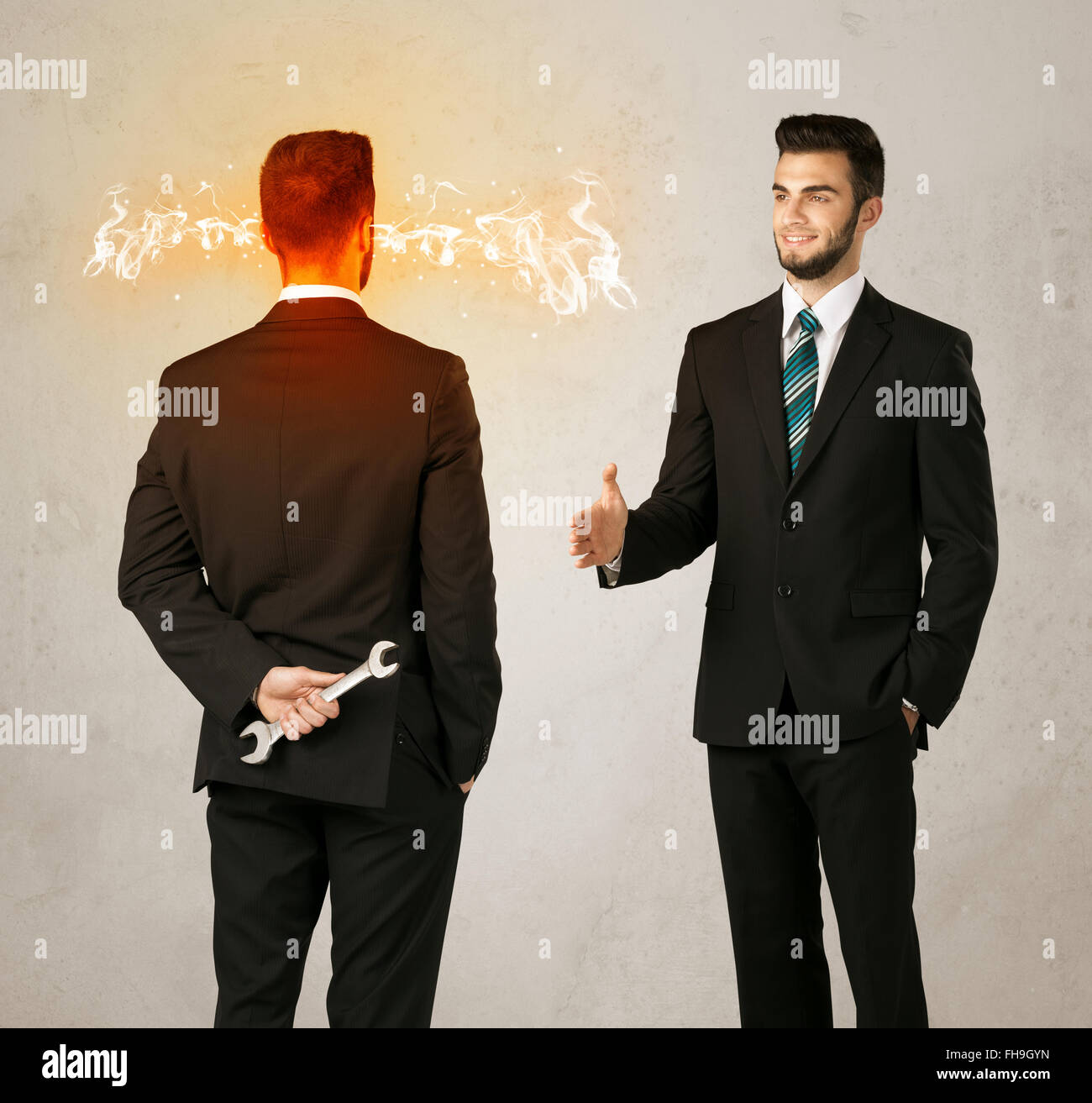Angry businessman with weapon Stock Photo - Alamy