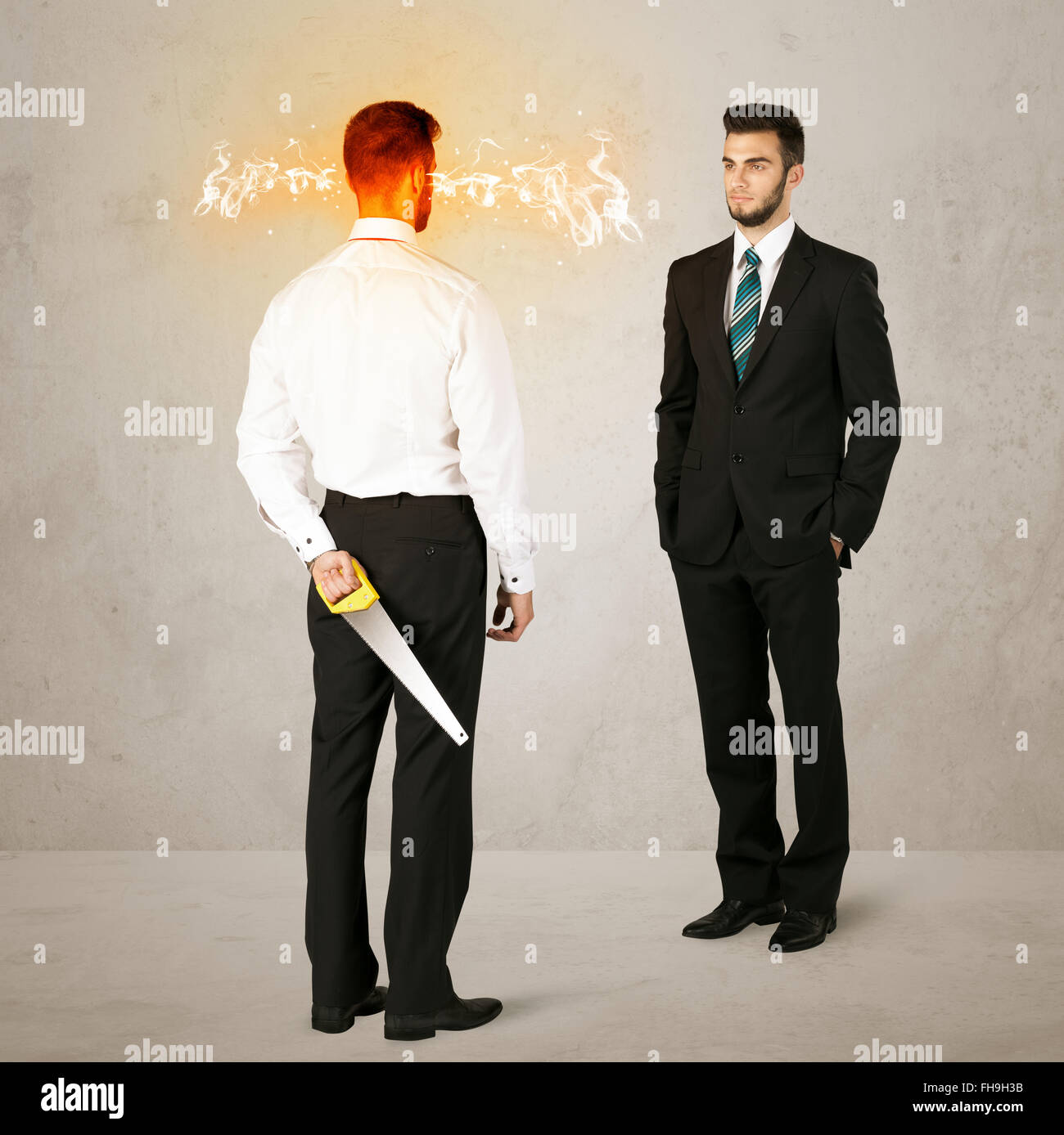 Angry businessman with weapon Stock Photo - Alamy