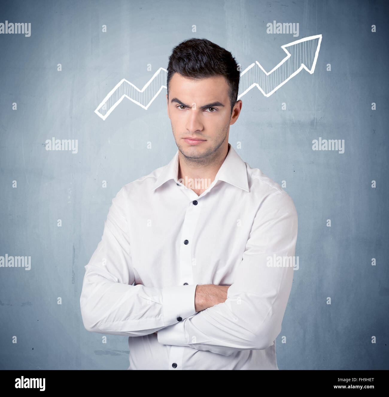 Smiling business guy with graph arrow Stock Photo - Alamy