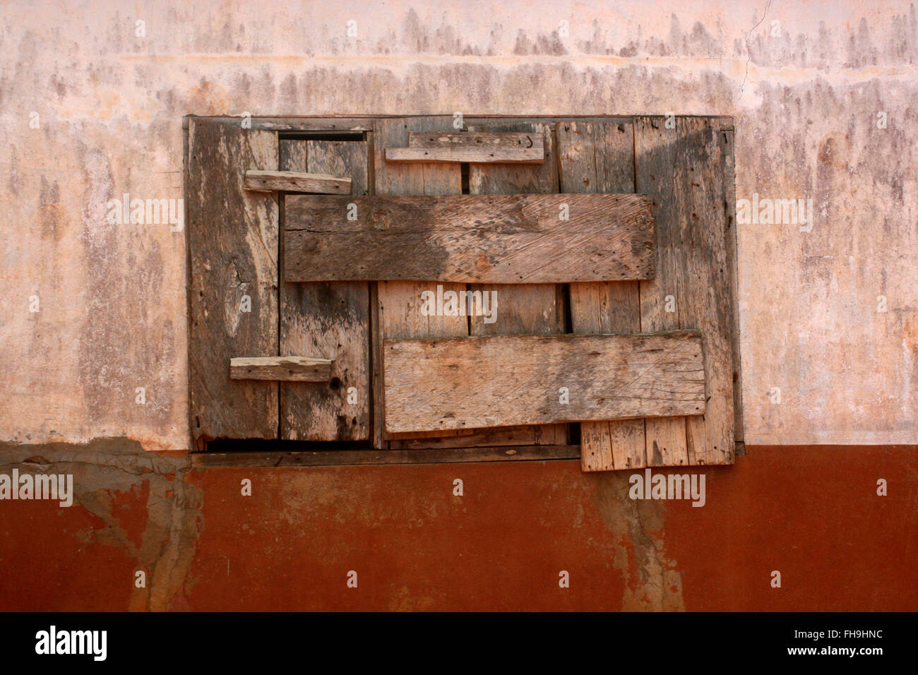 Boarded-up window and concrete wall for background texture Stock Photo ...
