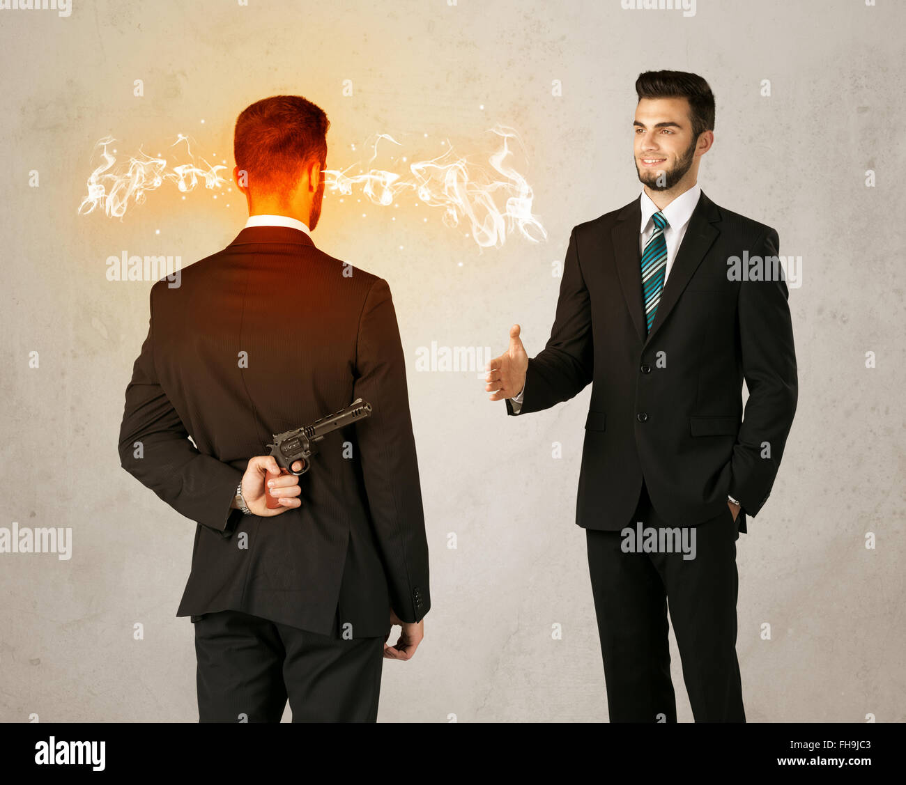 Angry businessman with weapon Stock Photo - Alamy