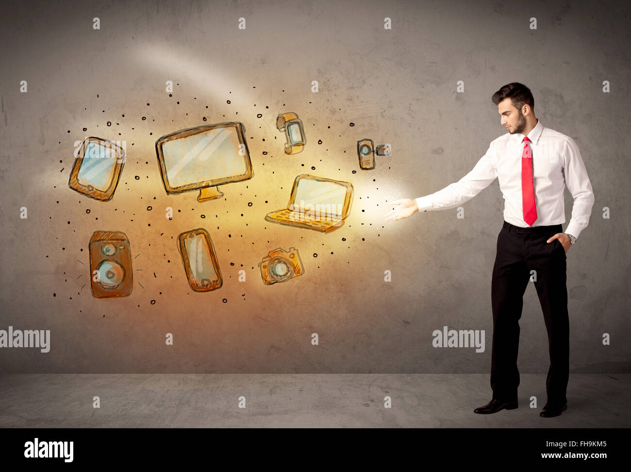 Man throwing hand drawn electronical devices Stock Photo - Alamy