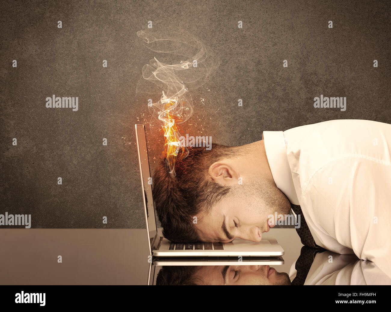 Sad business person's head catching fire Stock Photo - Alamy